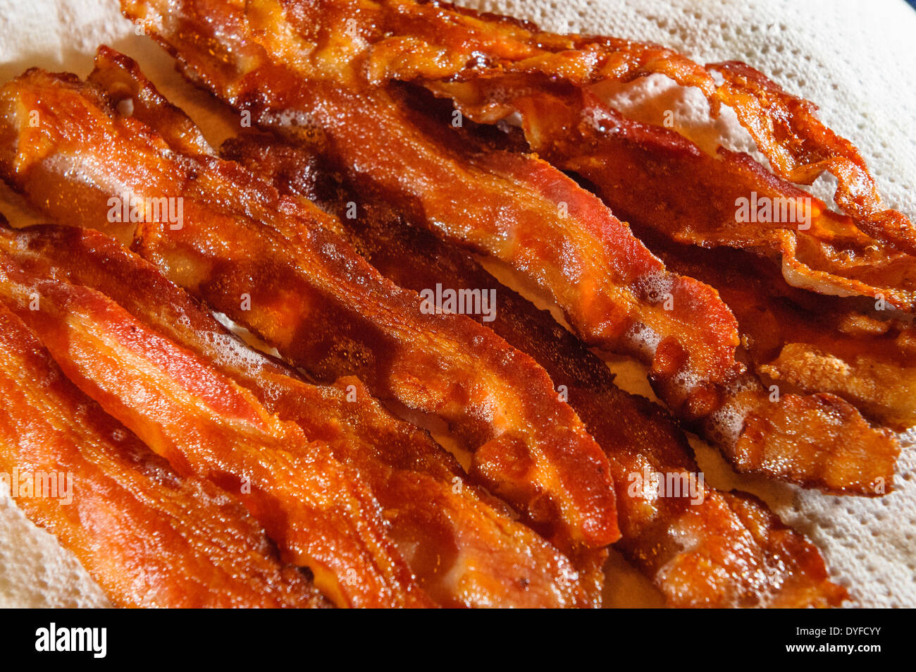 Fried bacon pieces Stock Photo - Alamy
