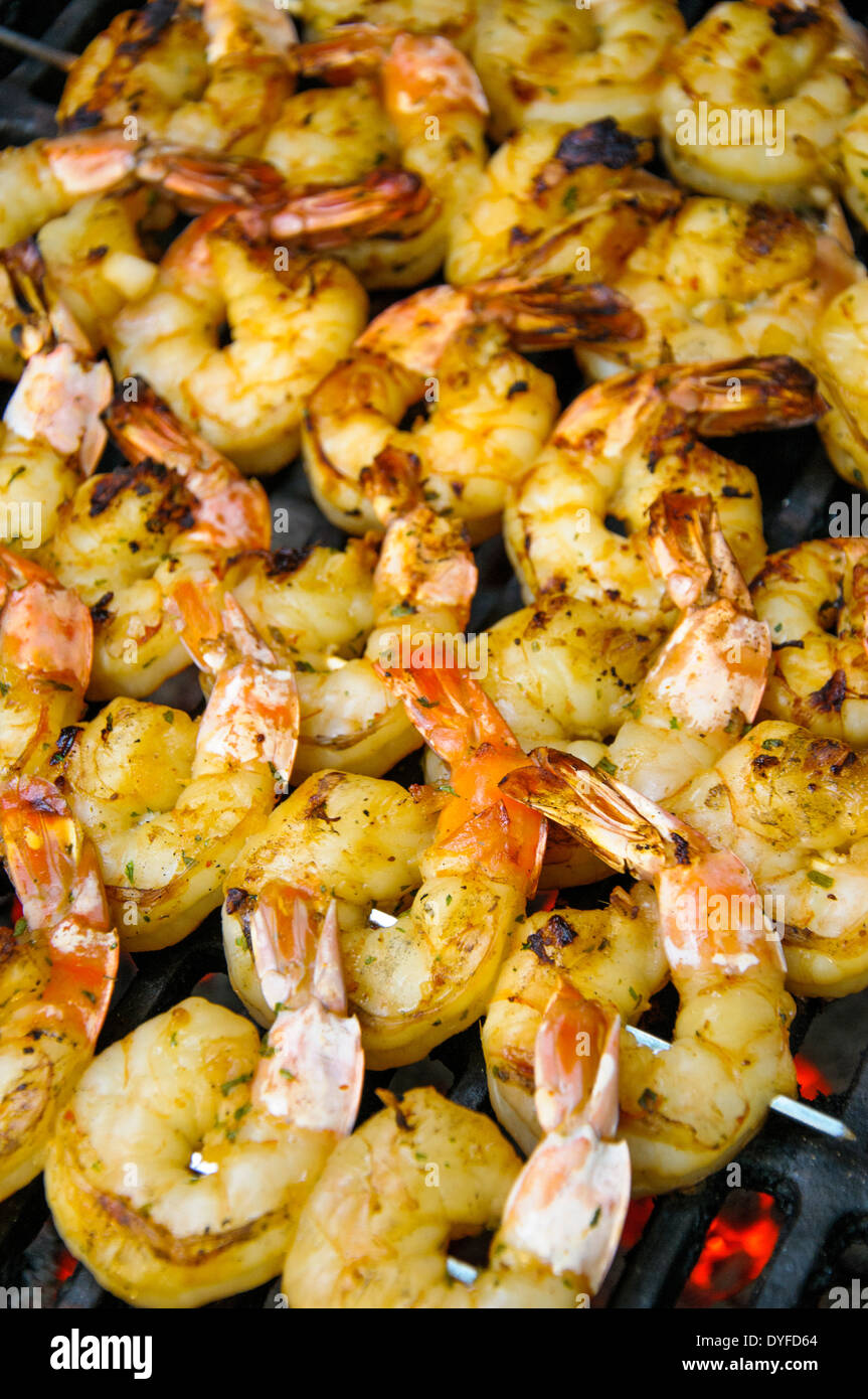 Shrimp skewers cooked over a low flame Stock Photo - Alamy