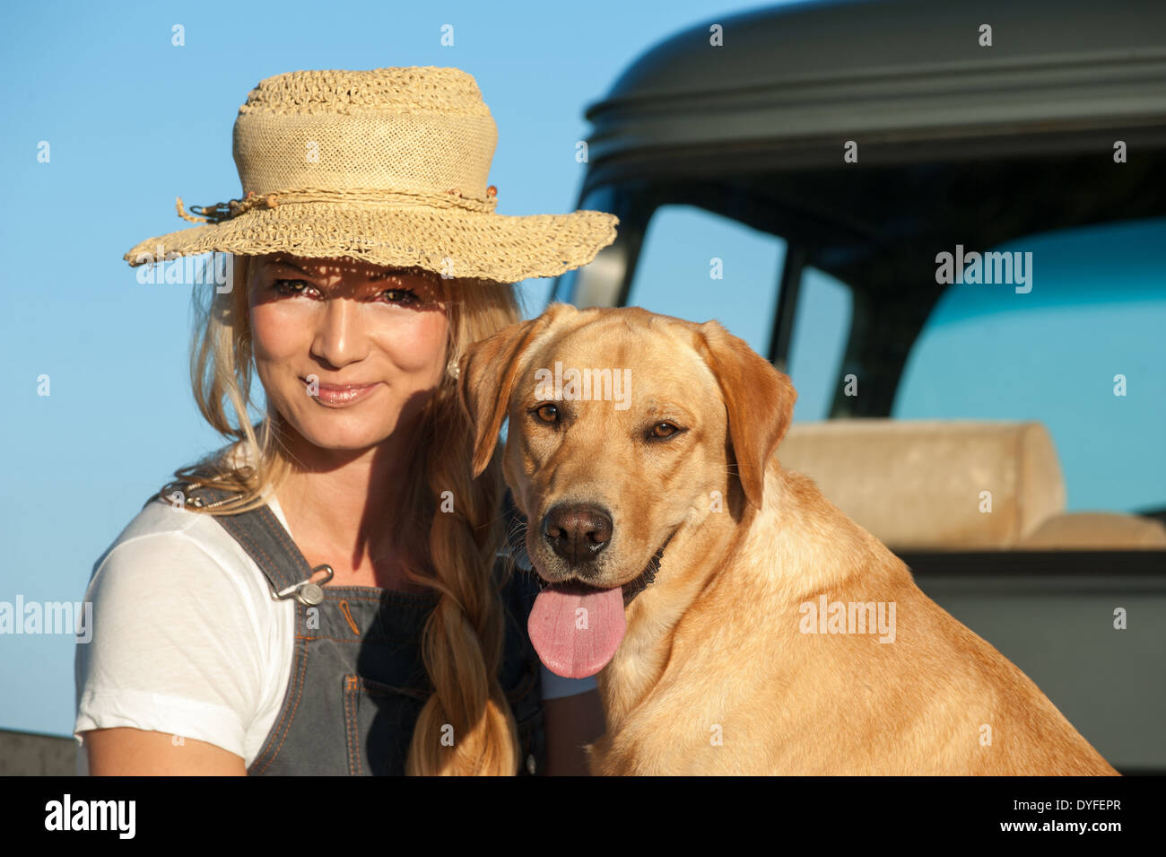 Woman with labrador retiever dog Stock Photo - Alamy