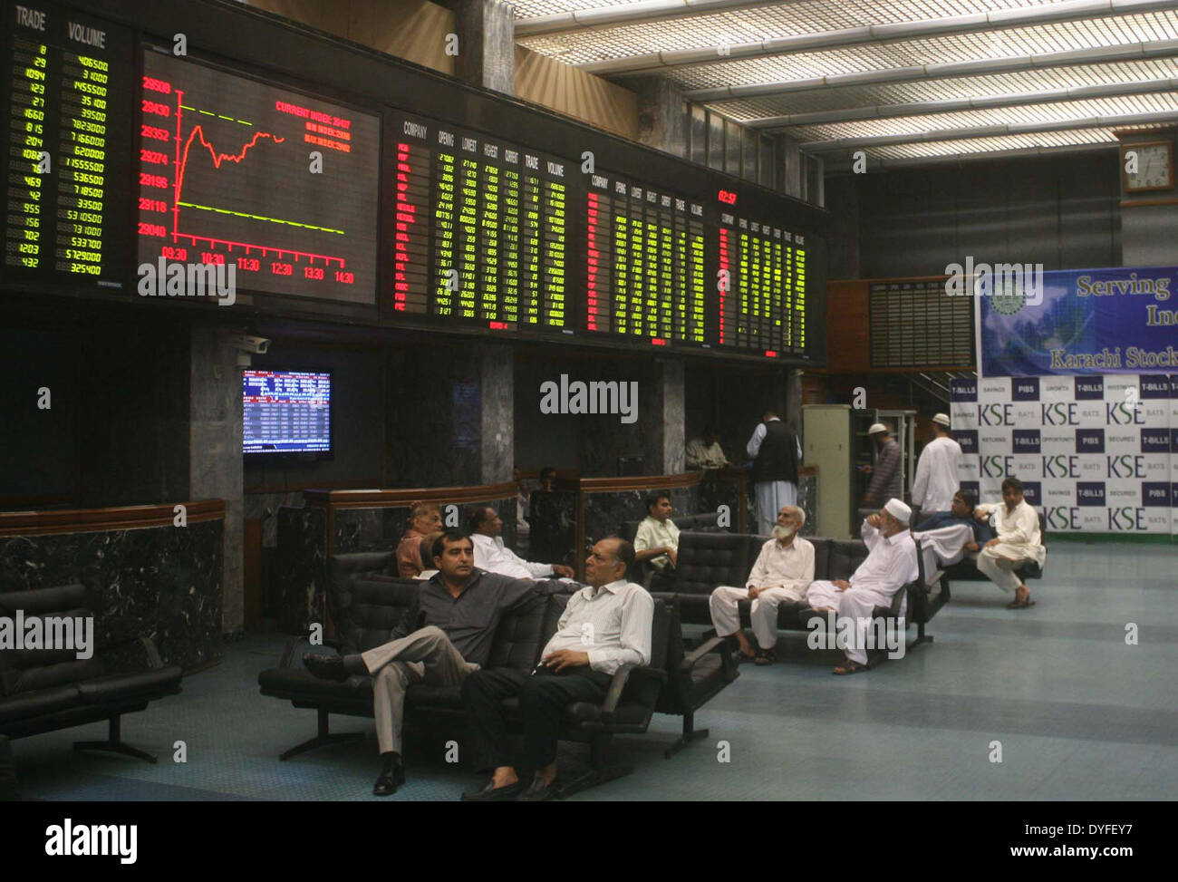 Trader busy in monitoring share prices during business timings at ...