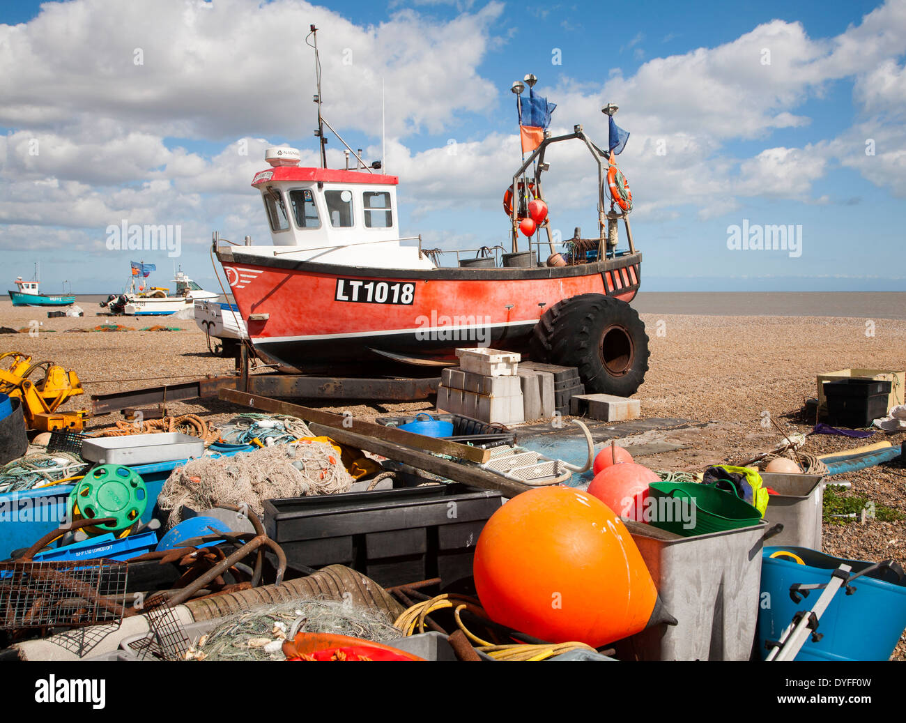 Fishing boats and equipment on the beach at Aldeburgh, Suffolk, England ...