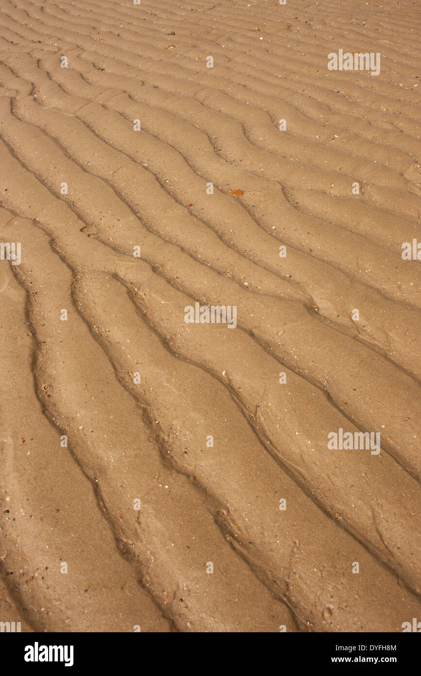 Tide Ripples left on the beach at Clacton Stock Photo - Alamy