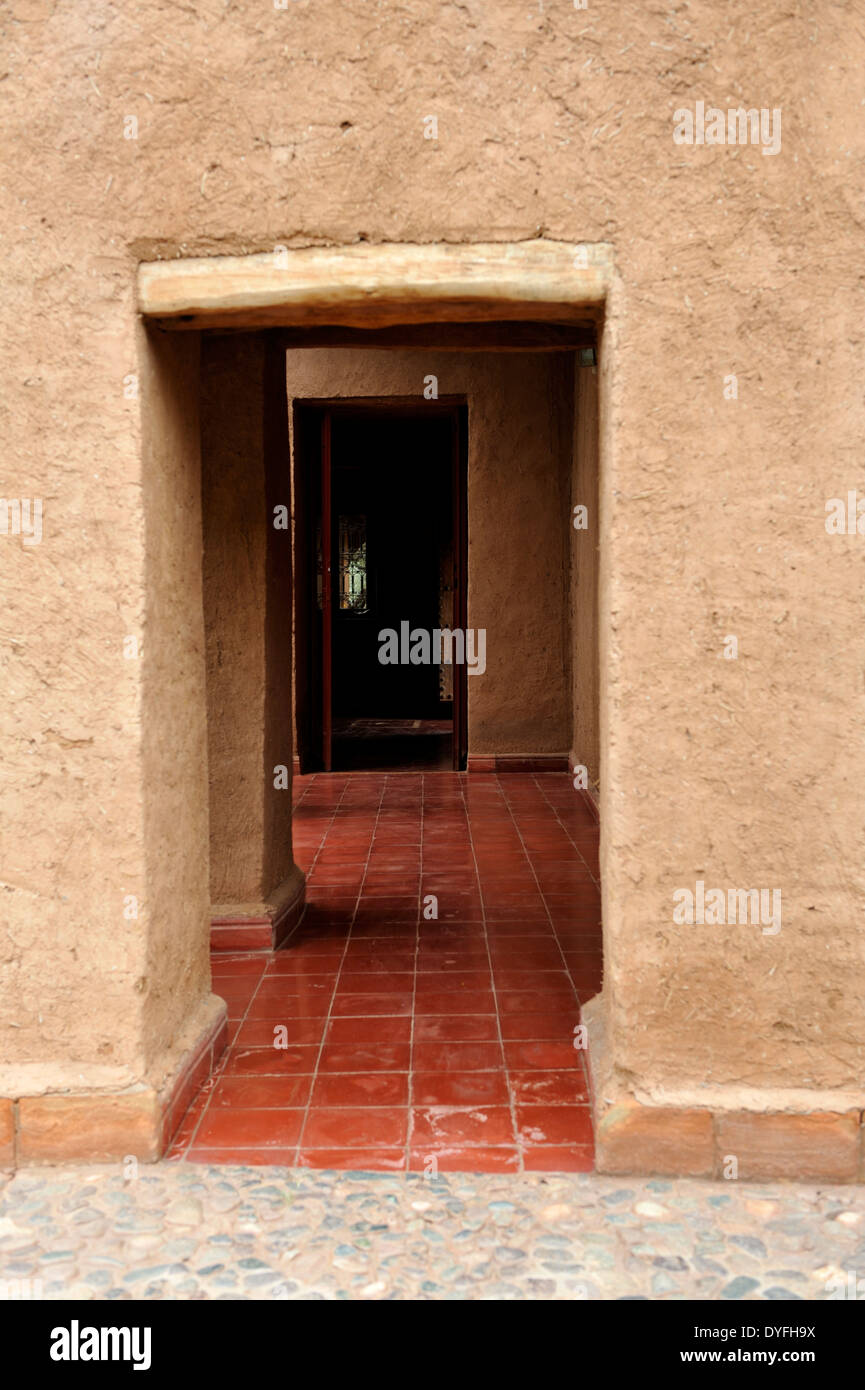 Corridor in adobe clay and straw built building Stock Photo - Alamy