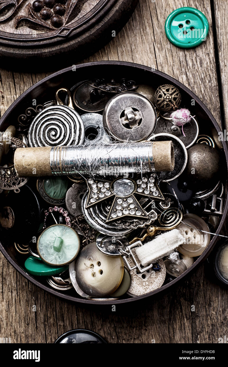 different buttons and zipper on the background of sewing tool Stock ...