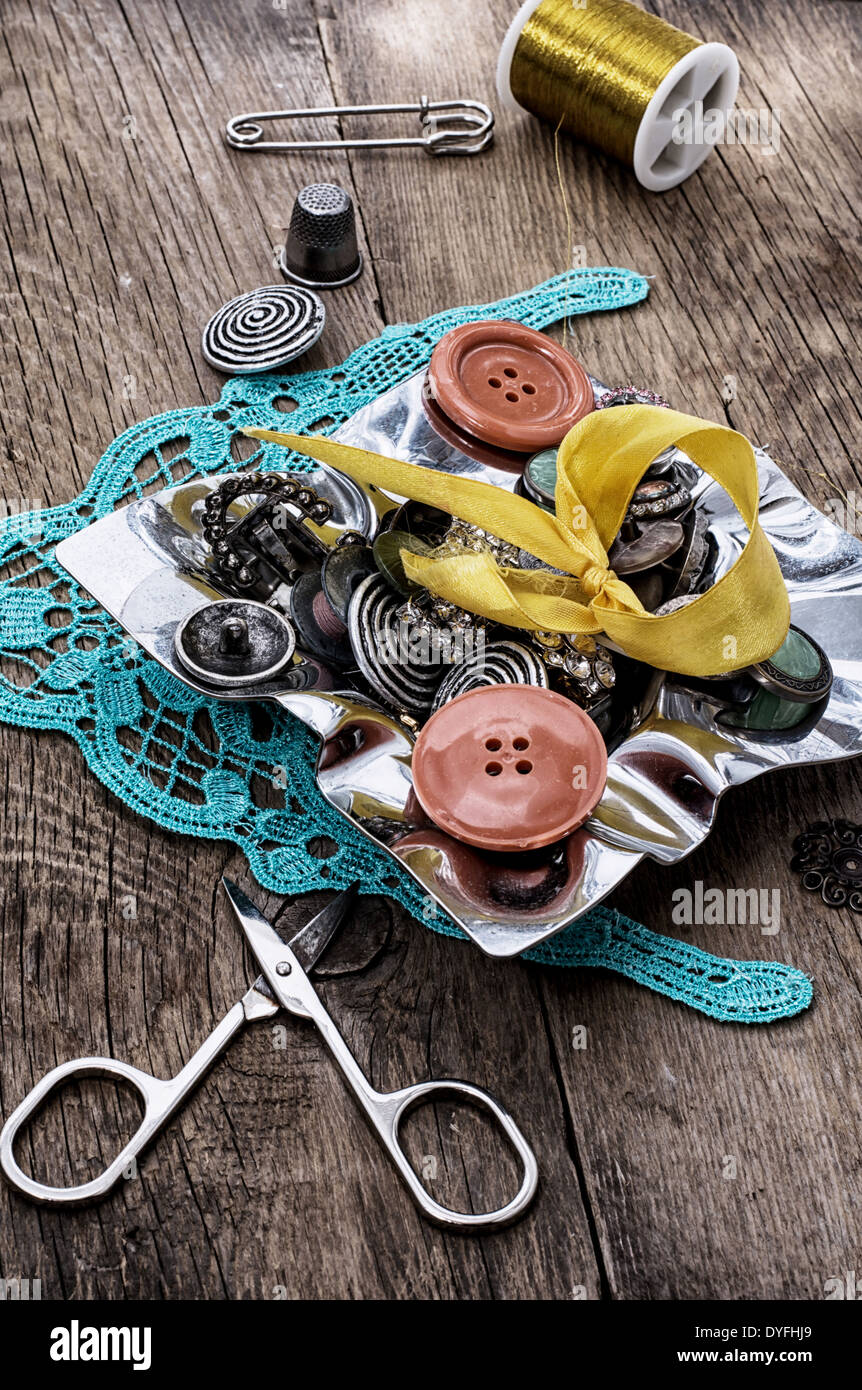 different buttons and zipper on the background of sewing tool Stock ...