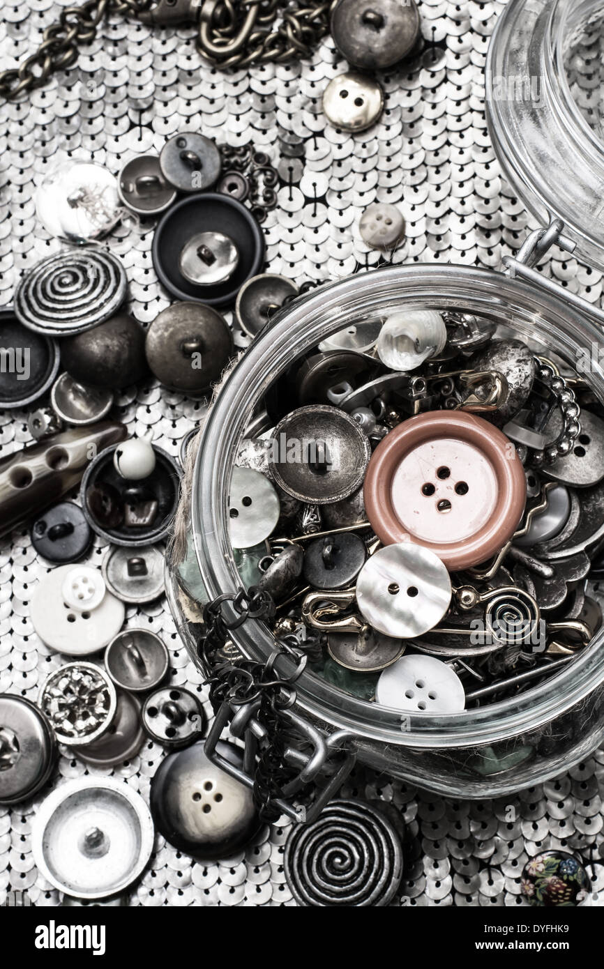 different buttons and zipper on the background of sewing tool Stock ...