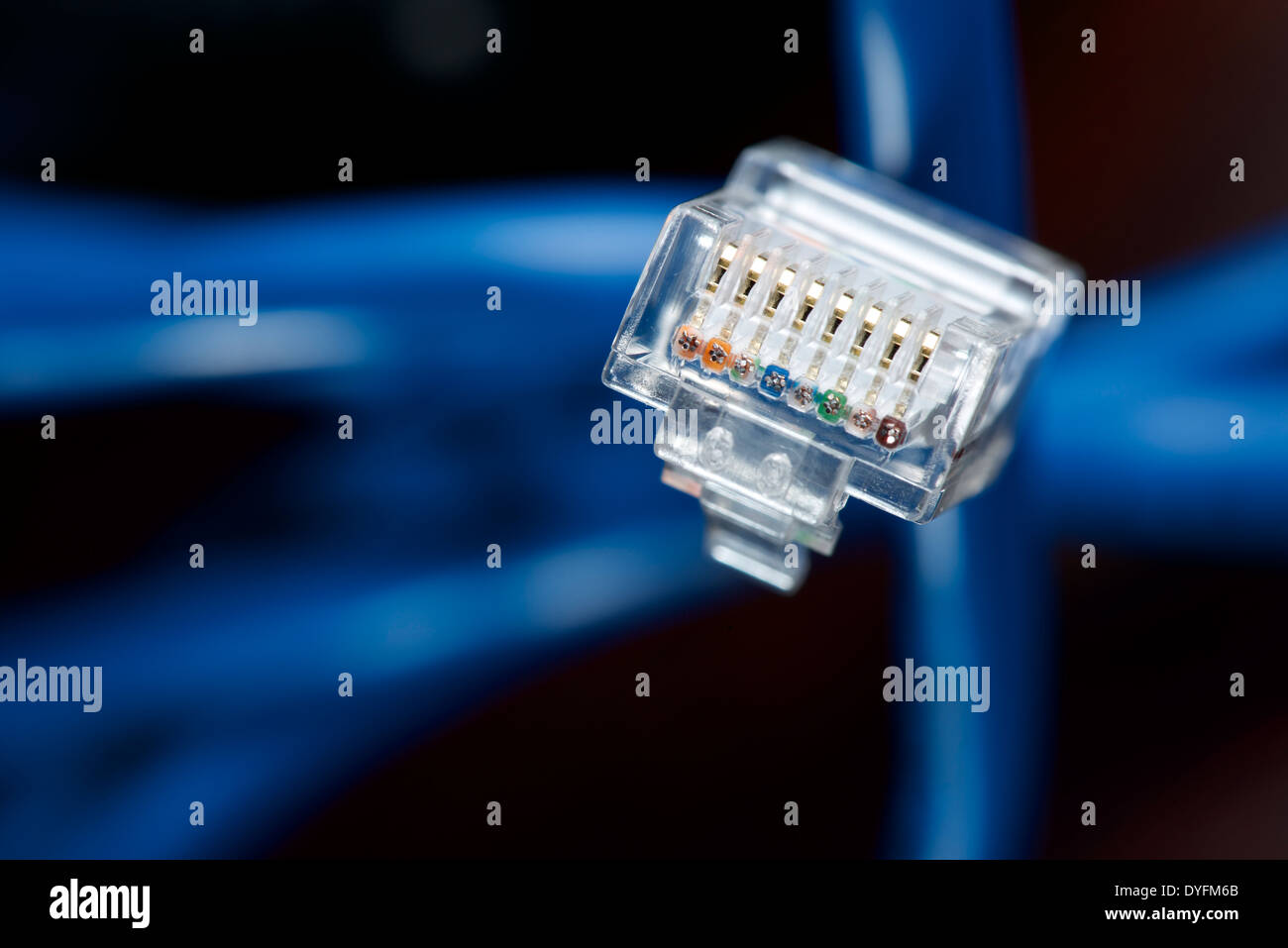 Blue ethernet cable computer and black background Stock Photo - Alamy
