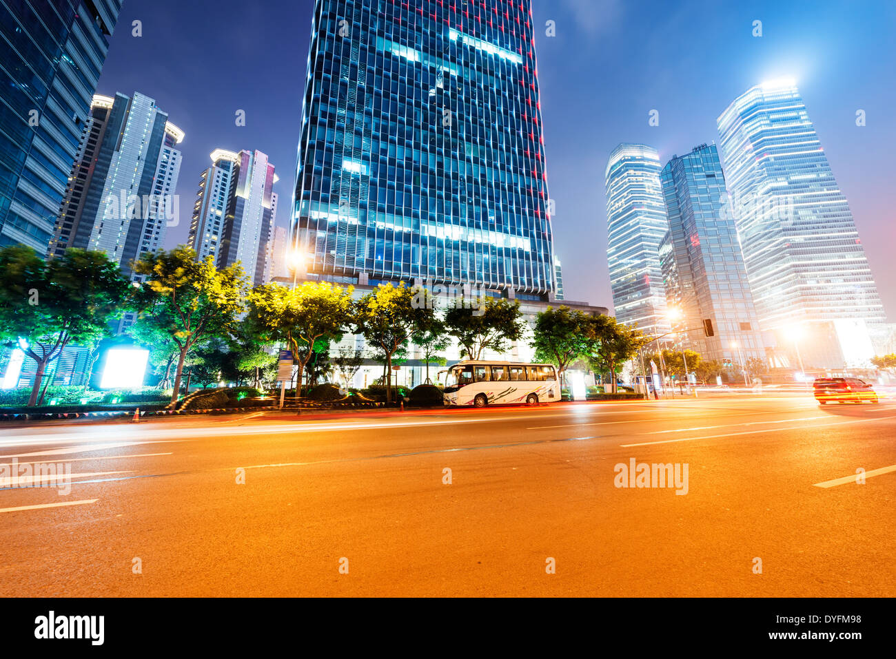 the light trails on the modern building background in shanghai china ...