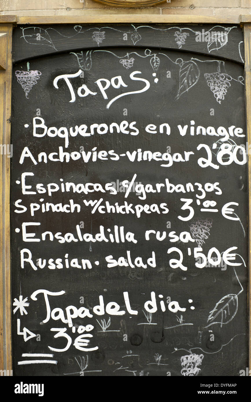 foreground of a poster of the menu in a typical Spanish restaurant ...