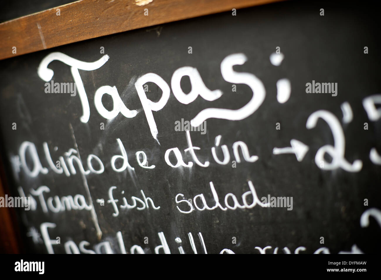 foreground of a poster of the menu in a typical Spanish restaurant ...
