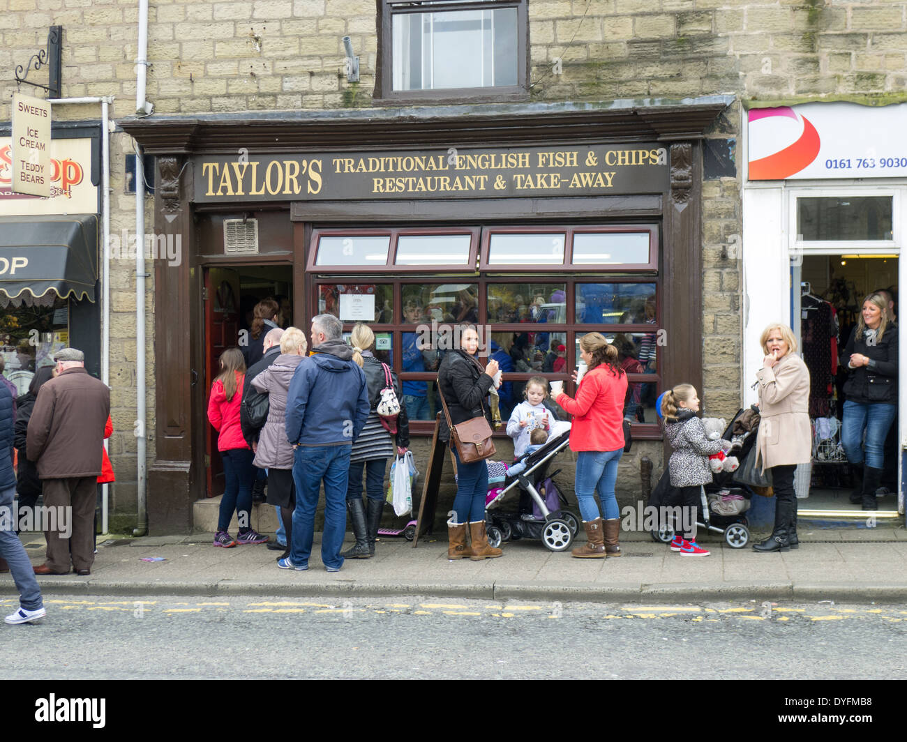Queue for fish and chip shop in Ramsbottom, Lancashire Stock Photo - Alamy