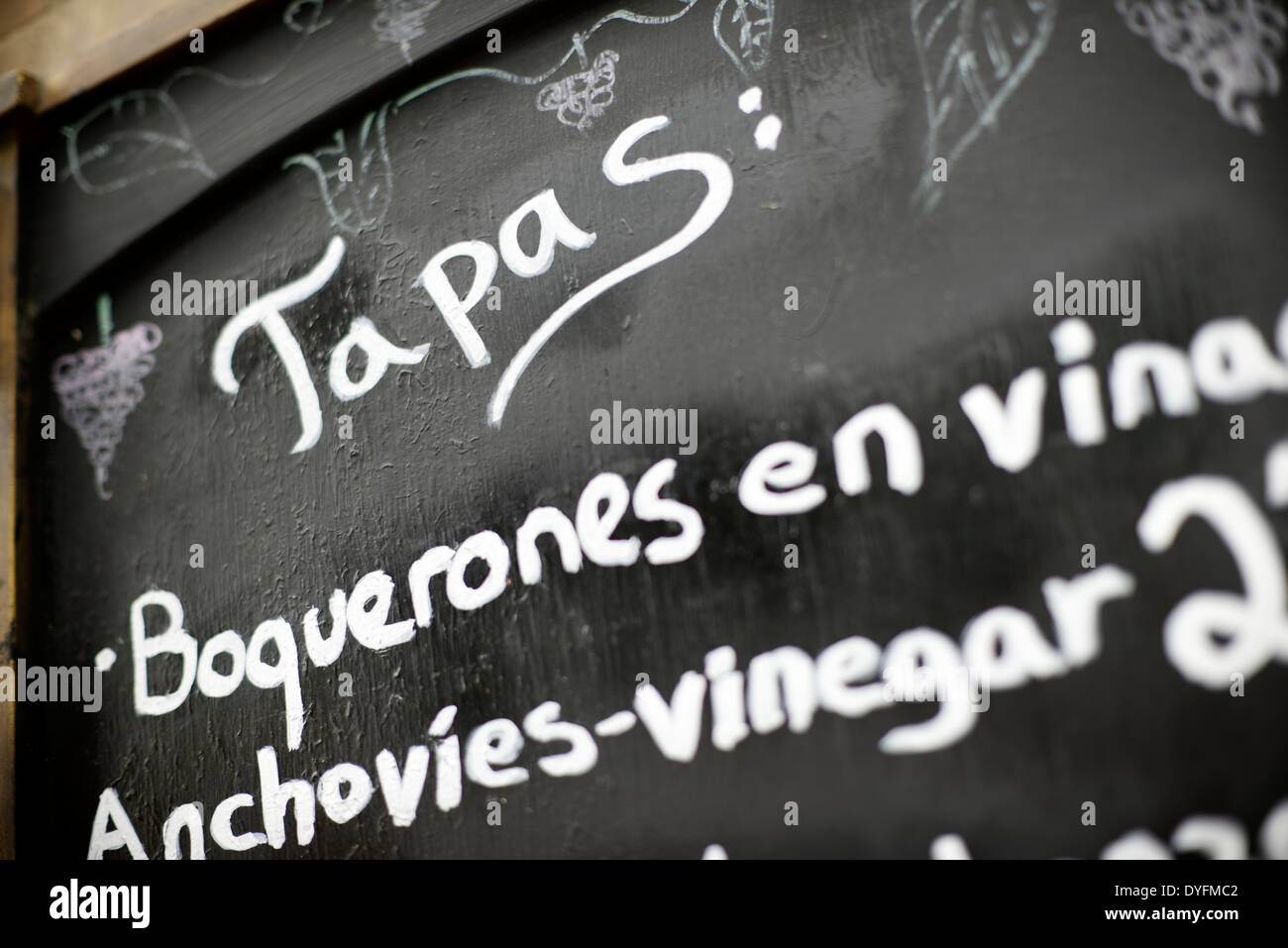 foreground of a poster of the menu in a typical Spanish restaurant ...