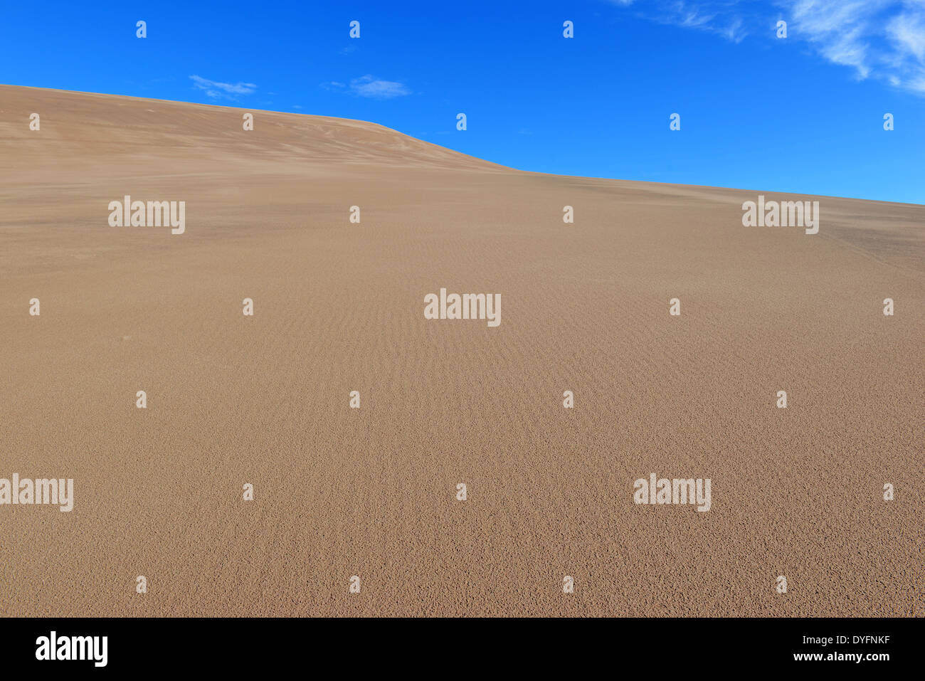 Sand Dunes and Blue Skies Stock Photo - Alamy