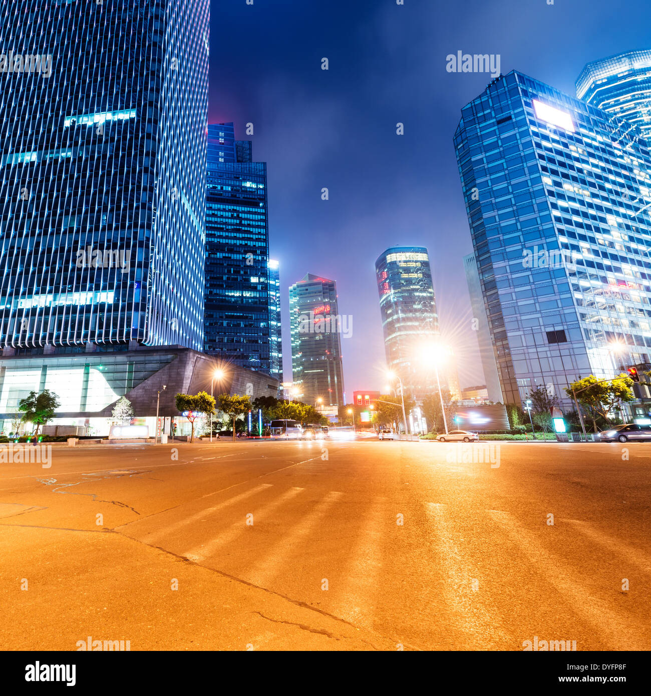 the light trails on the modern building background in shanghai china ...