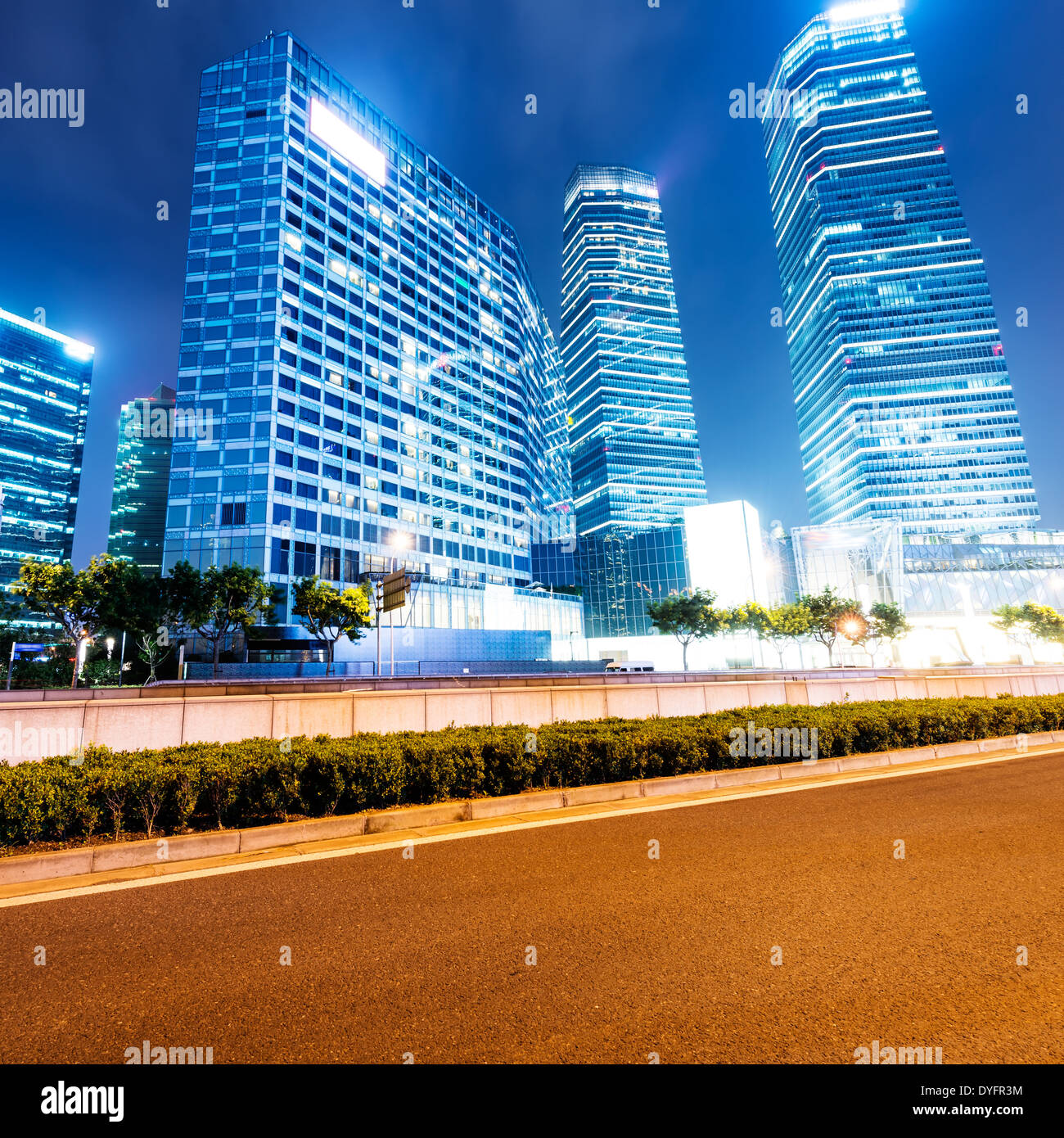 the light trails on the modern building background in shanghai china ...