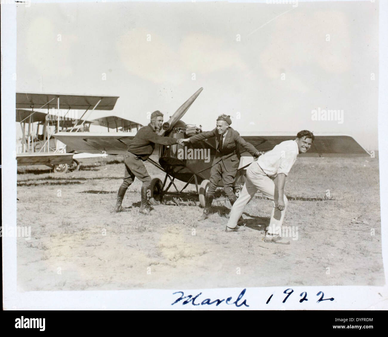This photo shows Frank Clarke, a famous barnstormer, performing stunt ...