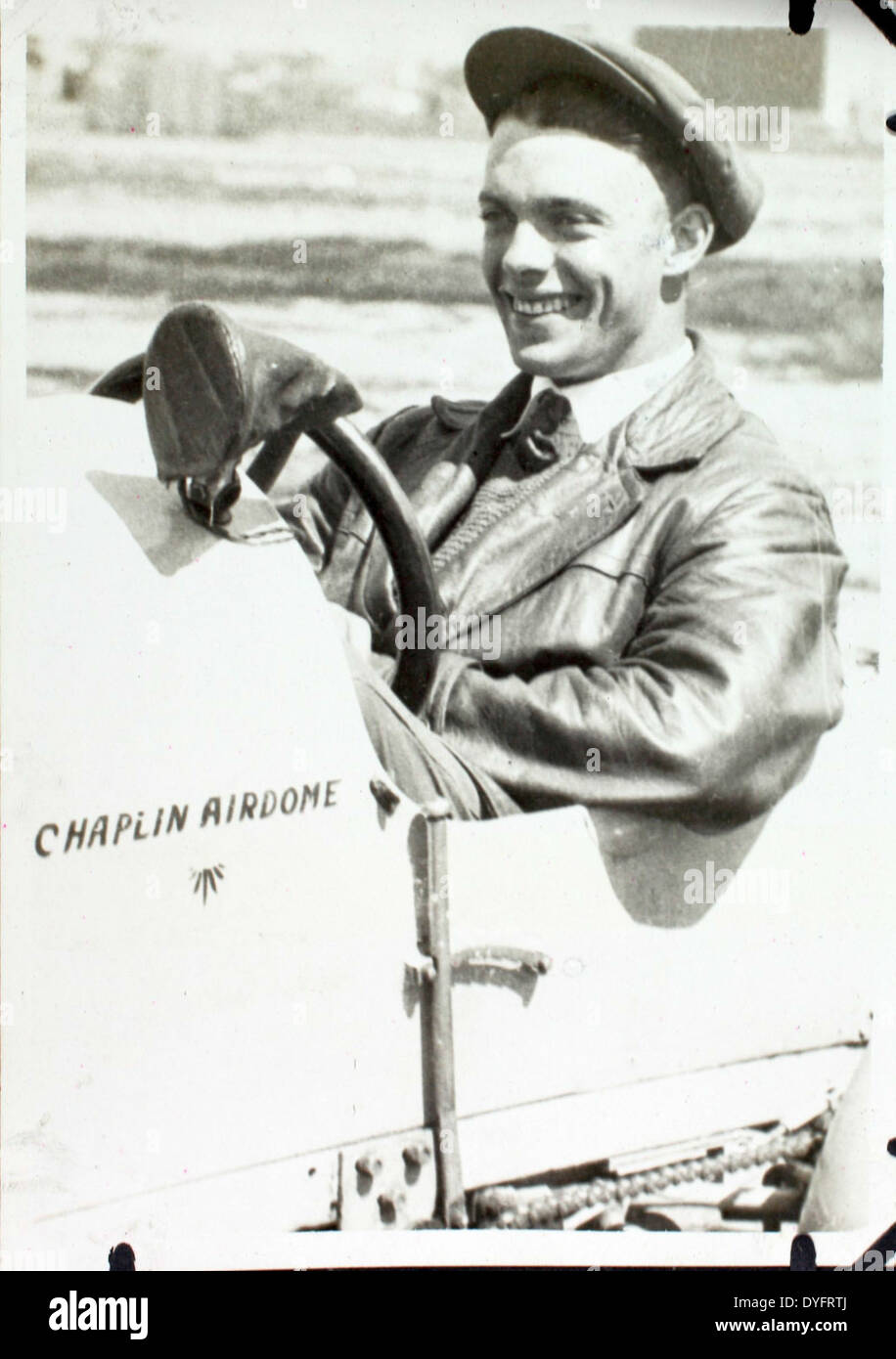 This photograph from Frank Clarke's album captures a stunt flying ...