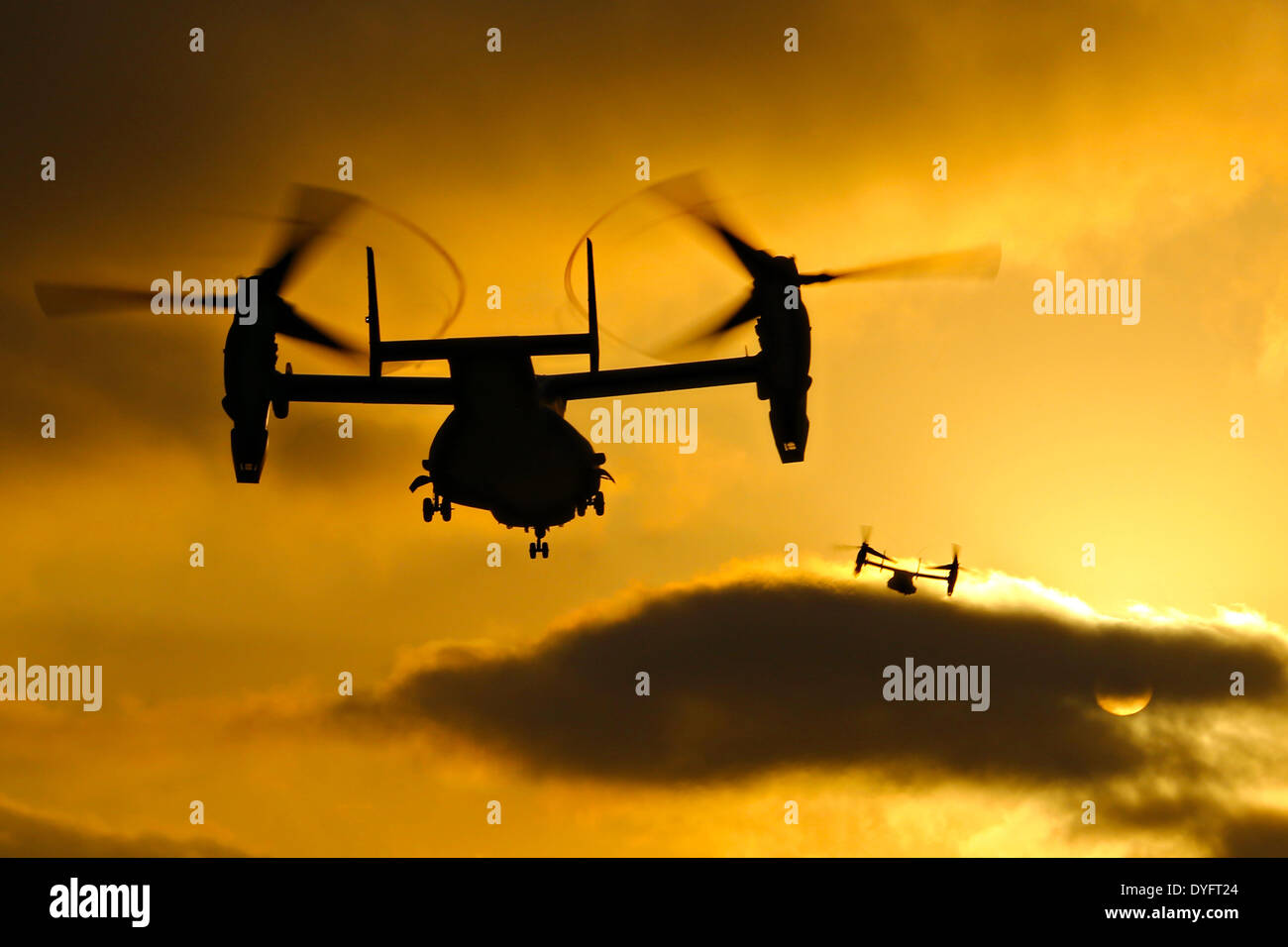 A US Marine Corps MV-22 Osprey aircraft take off from the flight deck ...