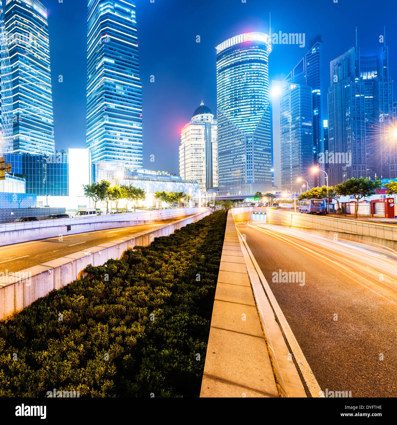 the light trails on the modern building background in shanghai china ...
