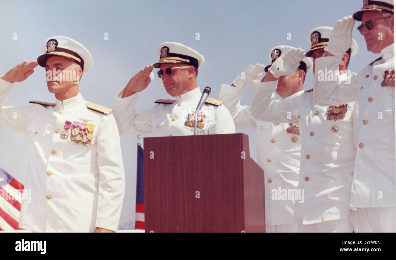 This photograph shows a Change of Command ceremony, a formal military ...