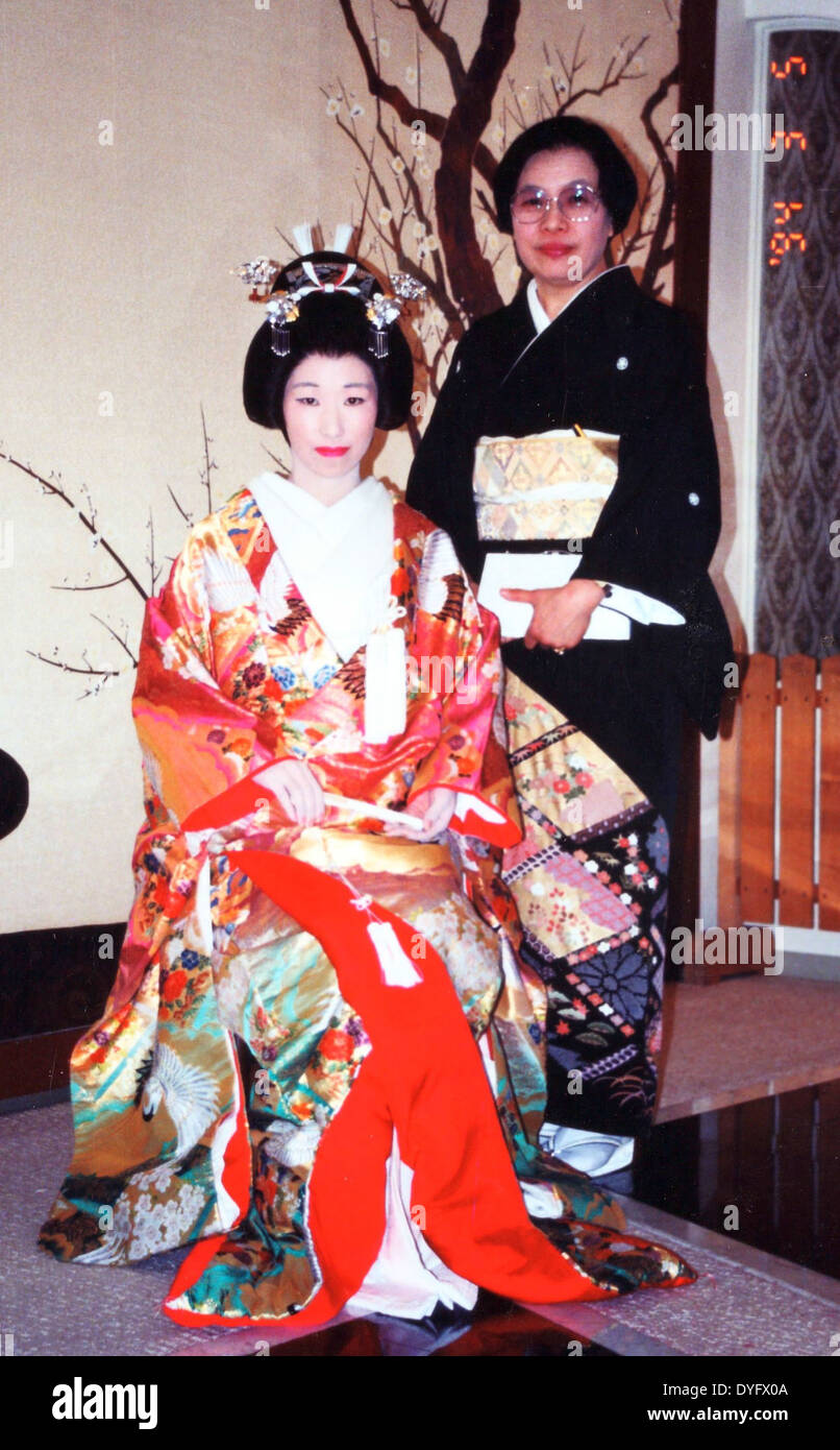 Yoshiko, seen with her bride in traditional wedding kimonos, was part ...