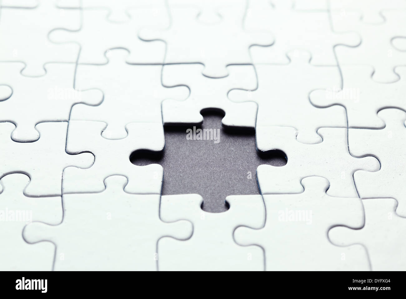 Missing puzzle piece Stock Photo - Alamy