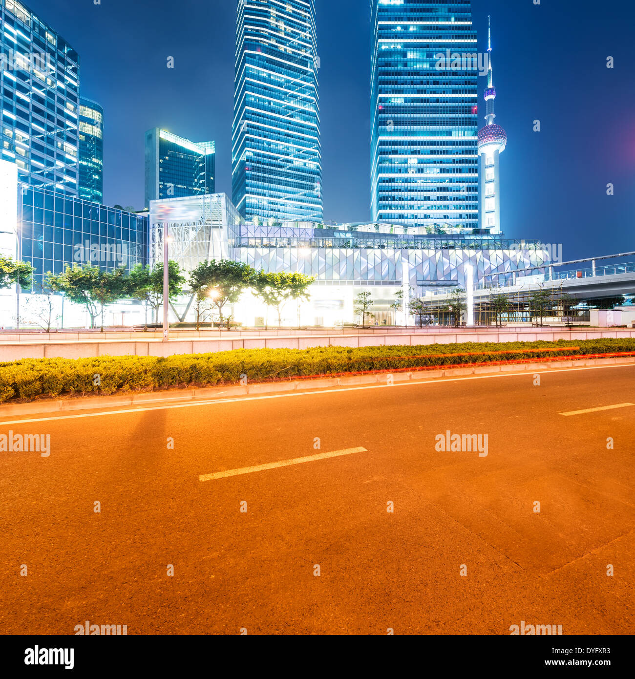 the light trails on the modern building background in shanghai china ...
