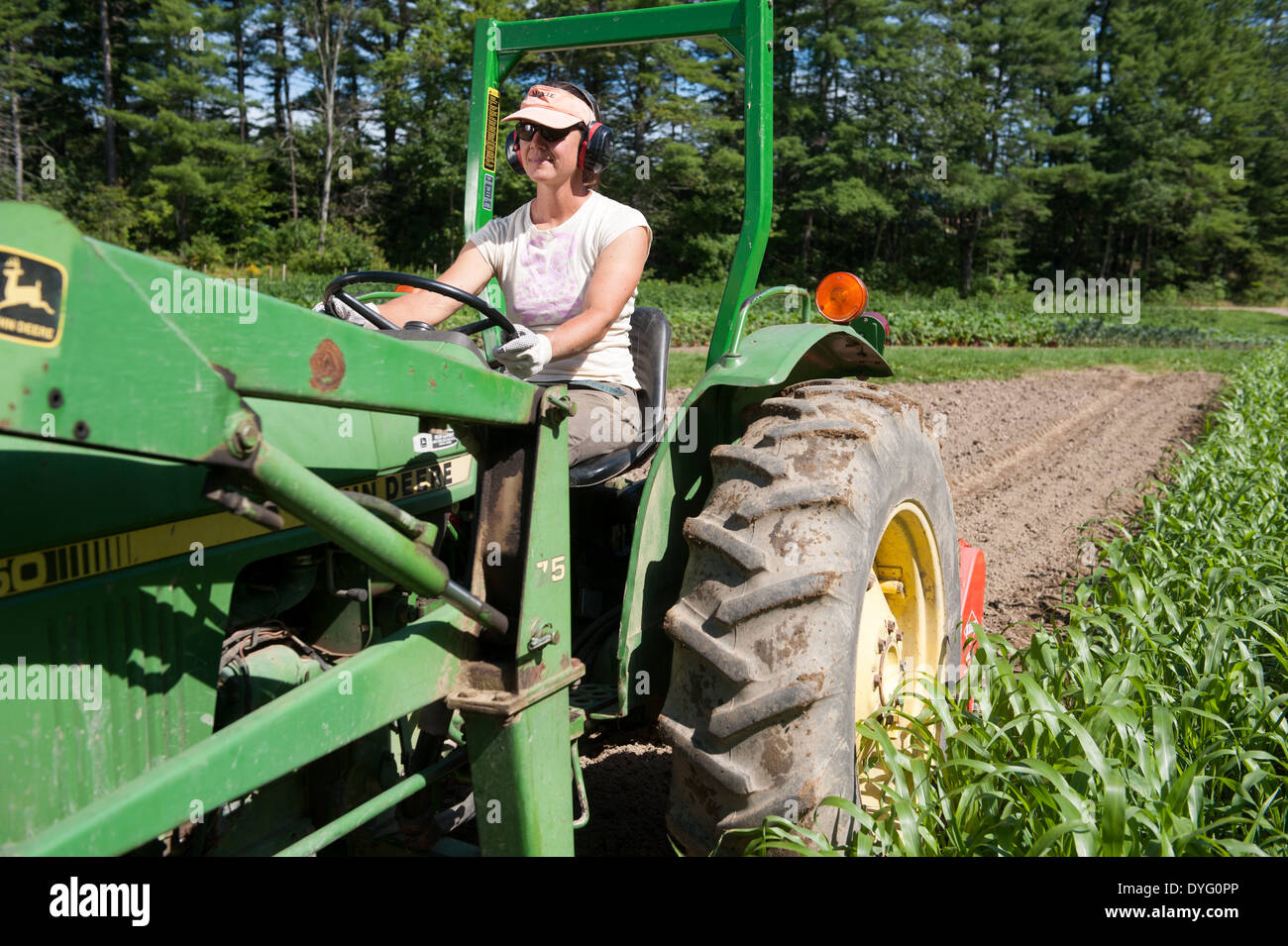 Woman driving tractor hi-res stock photography and images - Alamy