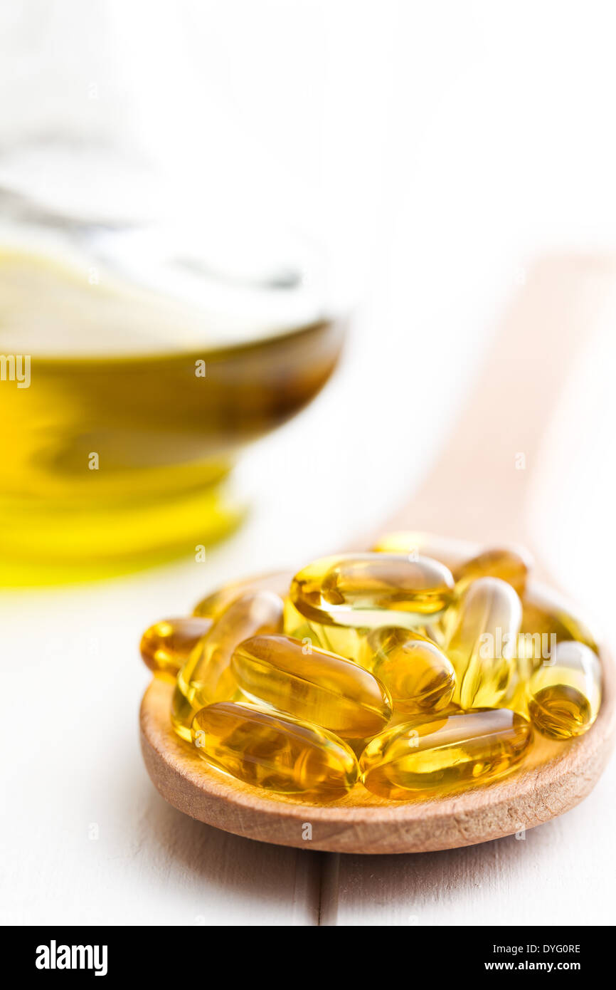 Herbal capsules wooden spoon hi-res stock photography and images - Alamy