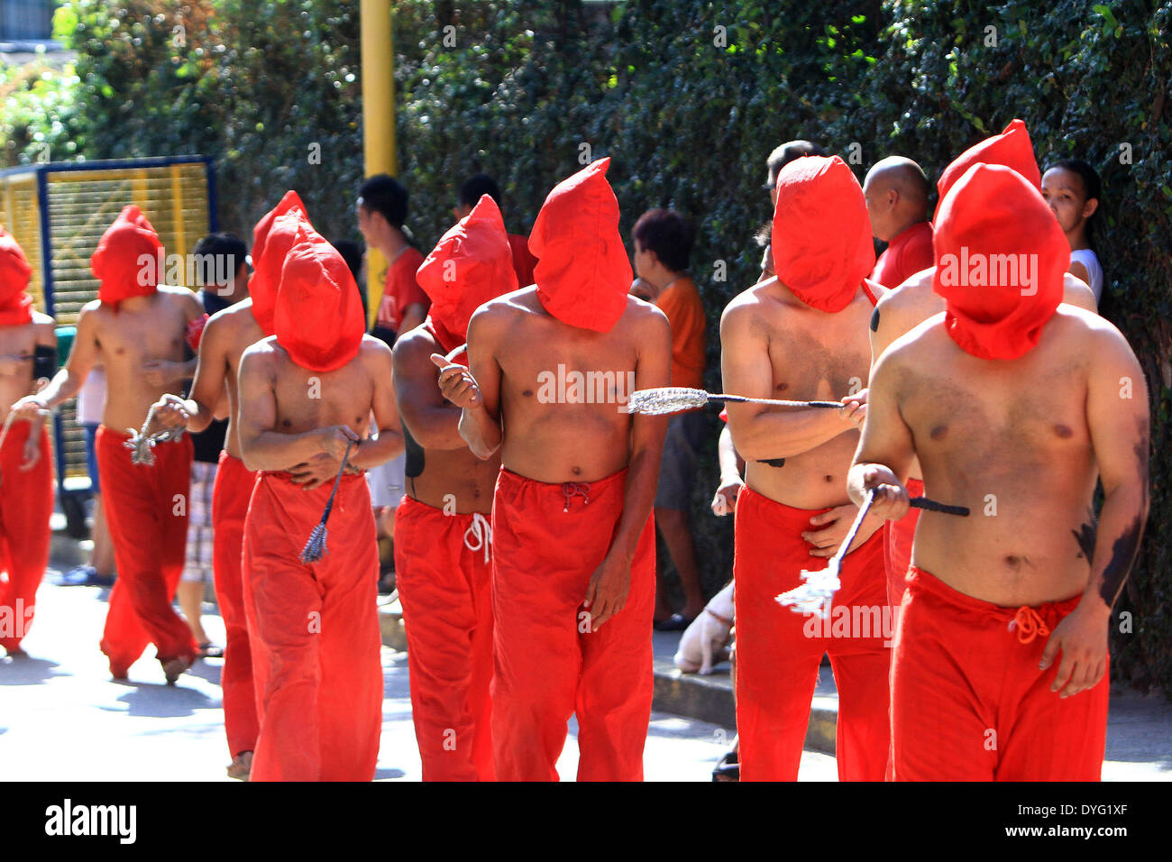 Mandaluyong City, Philippines. 17th Apr, 2014. Penitents flagellate ...