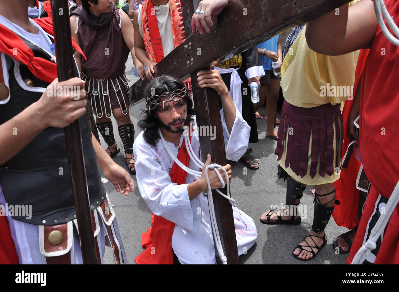 MANDALUYONG, PHILIPPINES - APRIL 17: A man portrays Christ during a ...