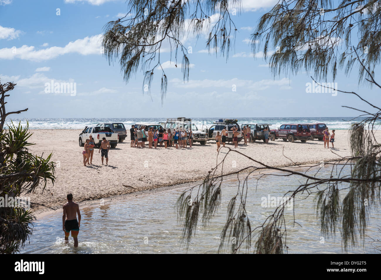 Tourists return to their vehicles following a cooling swim in Eli Creek ...