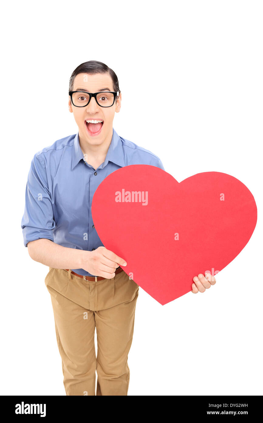 Man holding a big red heart Stock Photo - Alamy