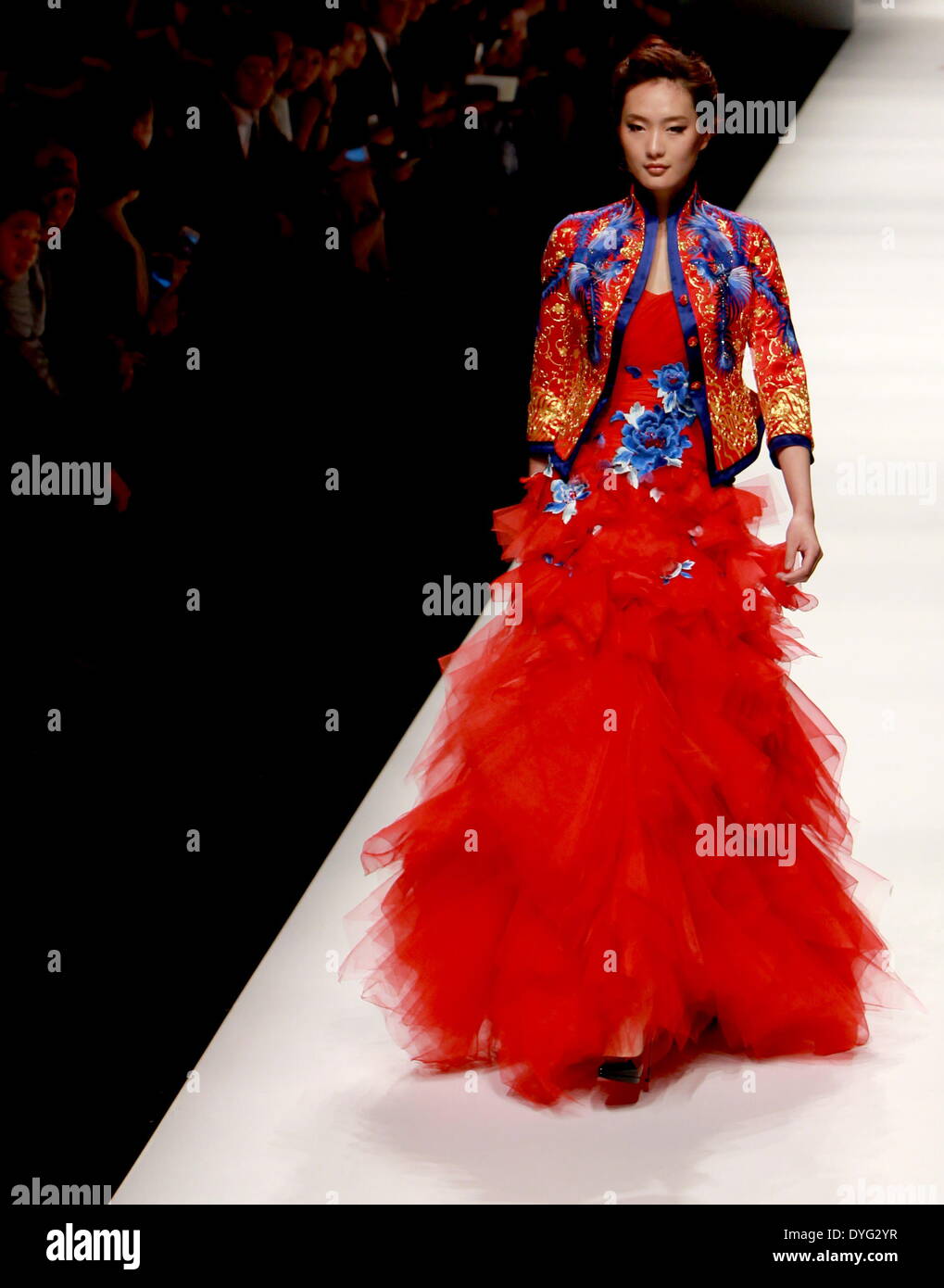 Shanghai, China. 16th Apr, 2014. A model presents a creation at the ...