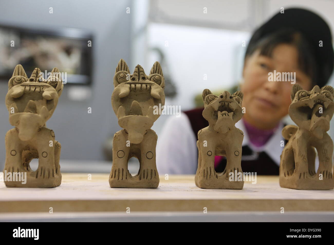 Beijing, China. 17th Apr, 2014. An artisan of the Bai ethnic group ...