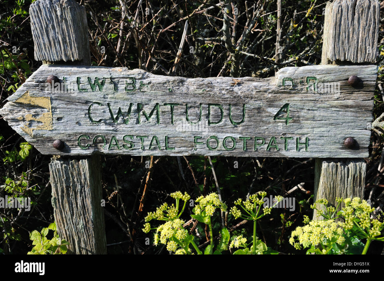 Old wooden sign to Cwmtudu on the Ceredigion Coast Path Wales Cymru UK ...