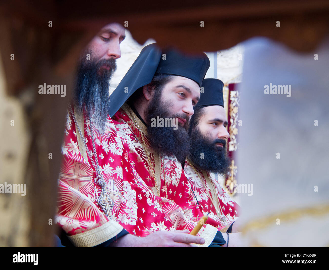 Jerusalem, Israel. 17th Apr, 2014. Barefooted priests await their turn ...