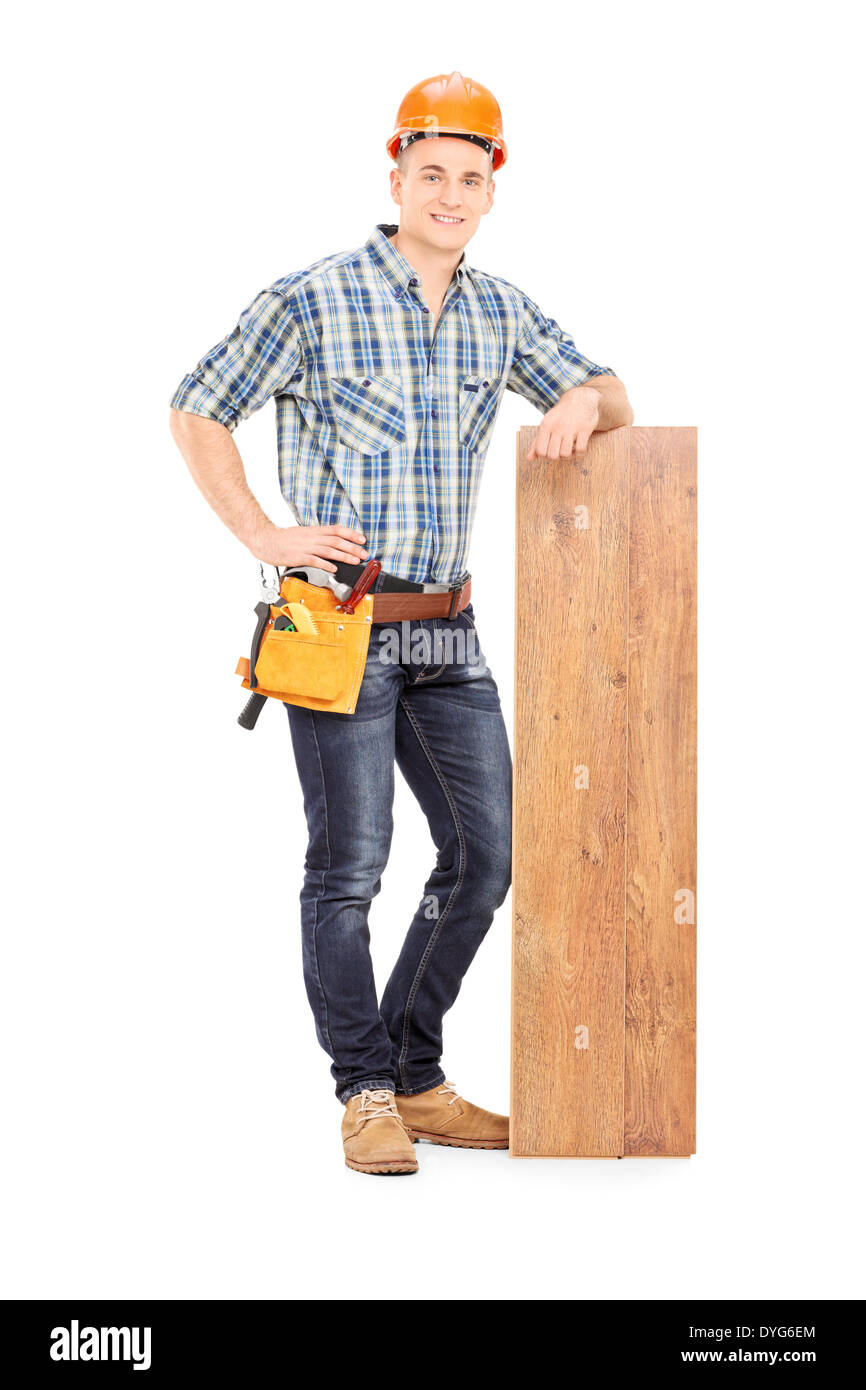 Full length portrait of male carpenter leaning on a plank Stock Photo ... Full length portrait of male carpenter leaning on a plank Stock Photo ...