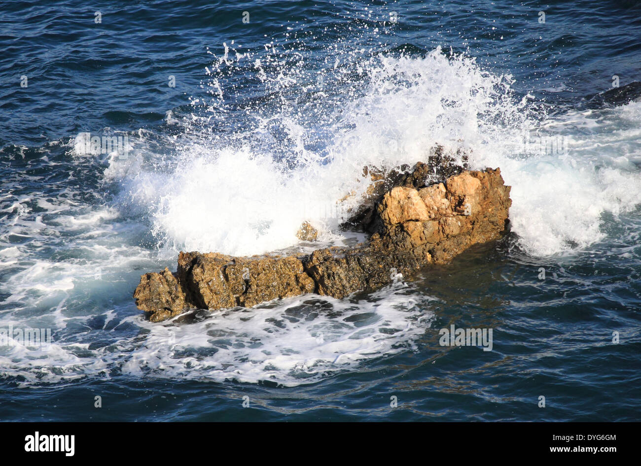 Waves crash against rocky coast hi-res stock photography and images - Alamy