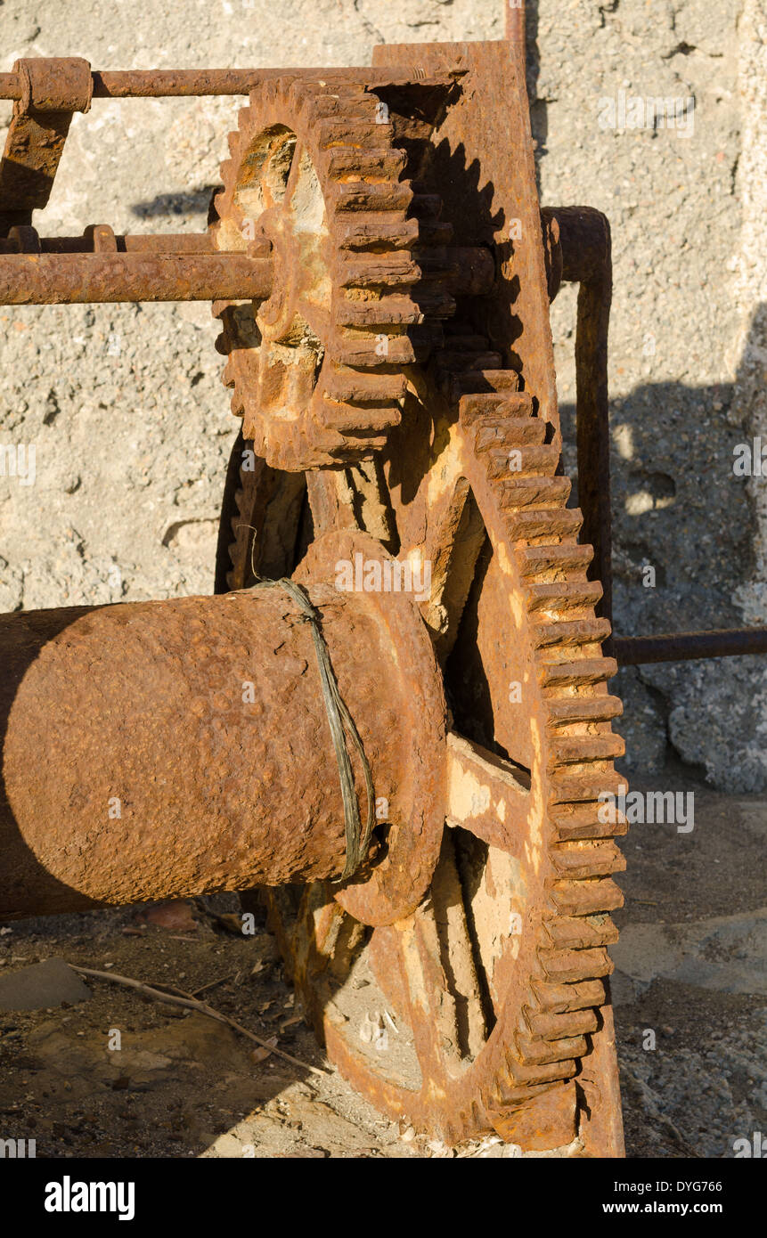 An old rusty machine with big cog wheels Stock Photo - Alamy