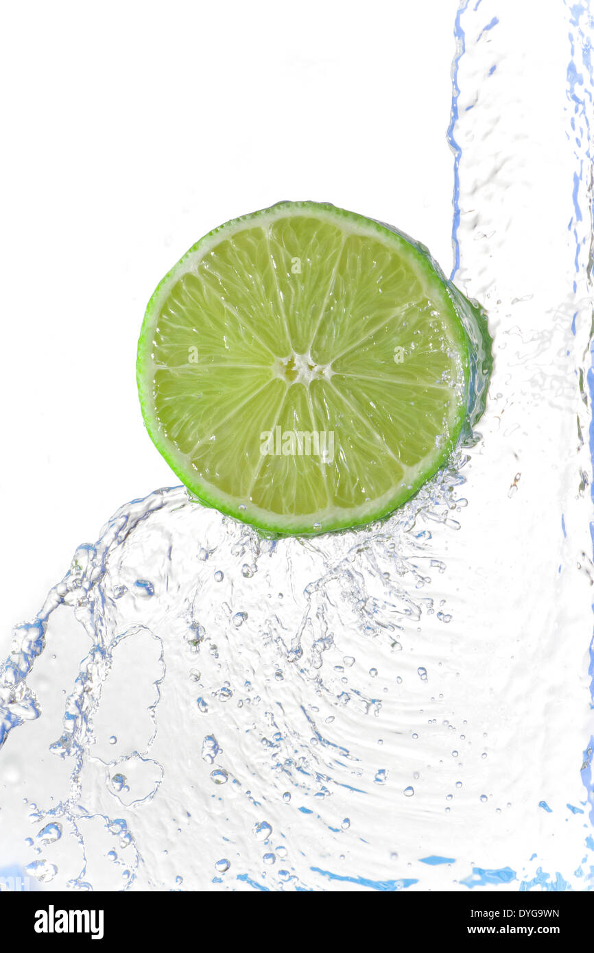Lime and water splash Stock Photo - Alamy