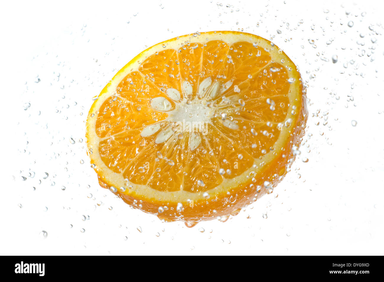 Orange and water splash Stock Photo - Alamy