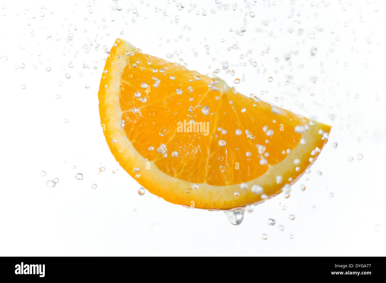 Orange and water splash Stock Photo - Alamy