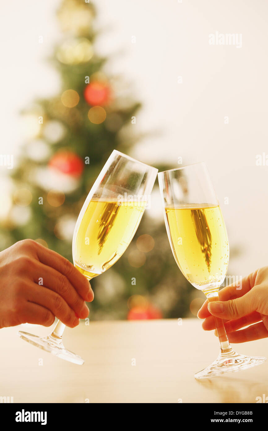 Couple toasting with Champagne Stock Photo - Alamy