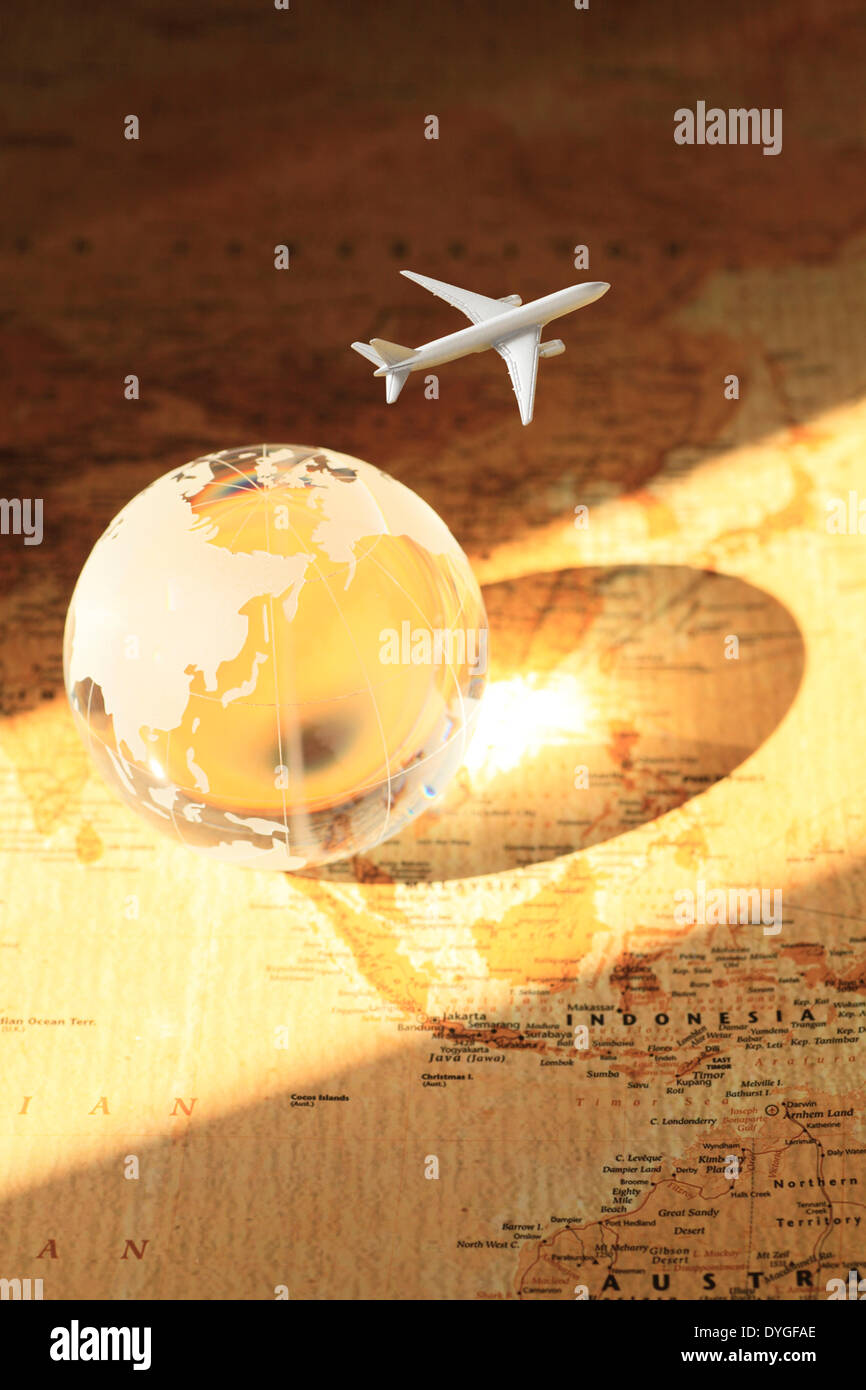 Glass globe and map Stock Photo - Alamy