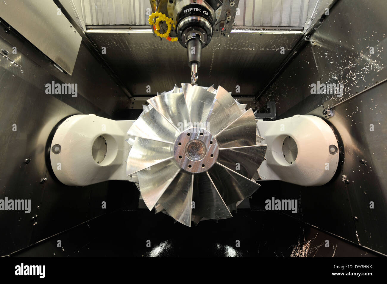 A multi axis cutting machine, cutting an impeller from a single block ...