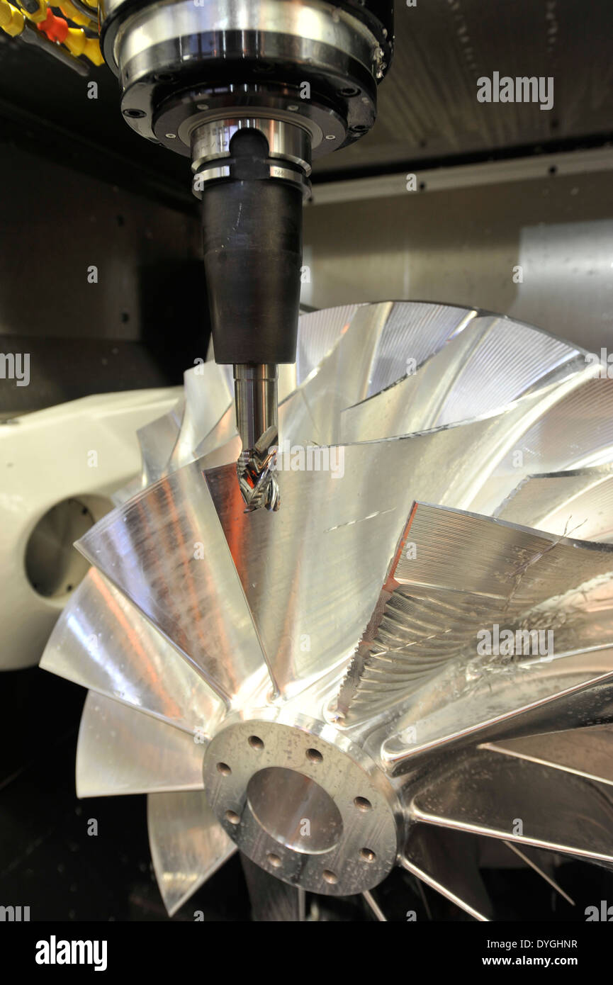 A multi axis cutting machine, cutting an impeller from a single block ...