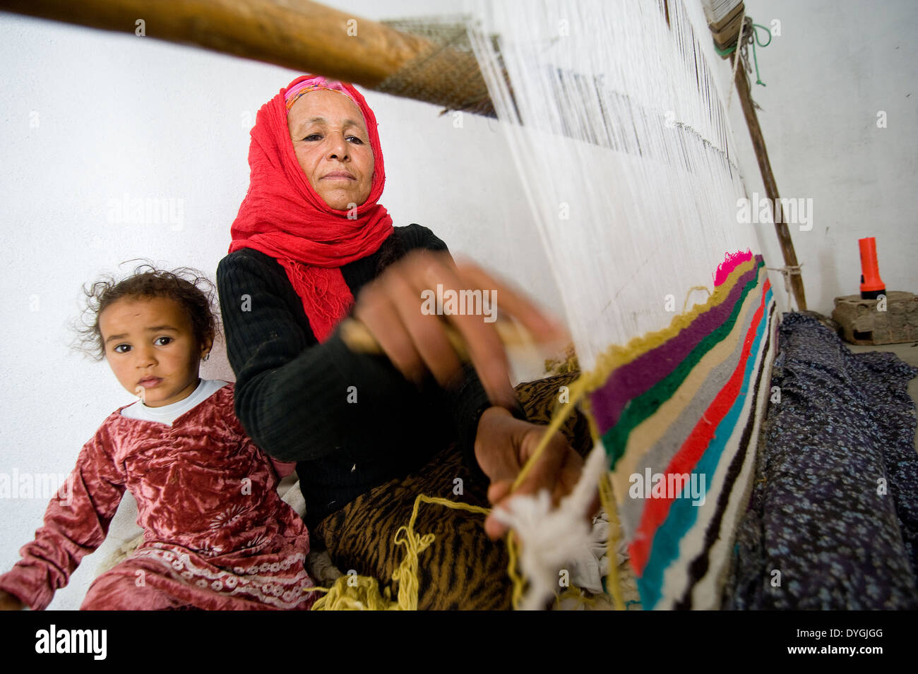 Muslim weaving mother child hi-res stock photography and images - Alamy