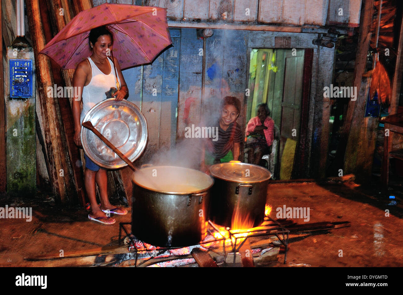 Elaboration of Chicha by traditional method for Fiesta de San Juan in ...