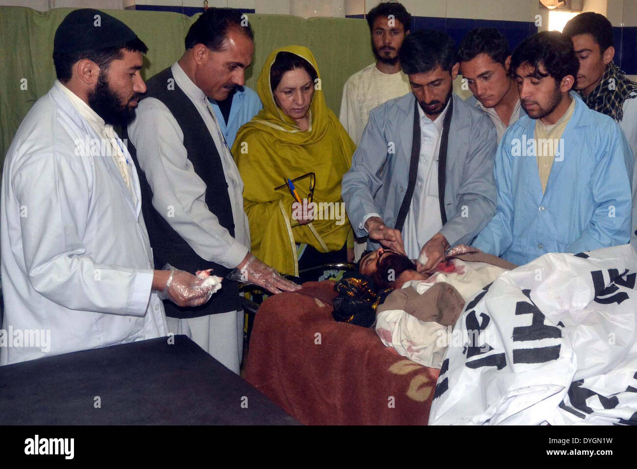 Paramedical staffs are busy in medical examination of dead body of a ...